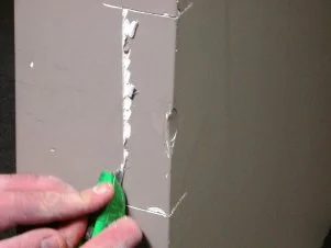 dented wall corner